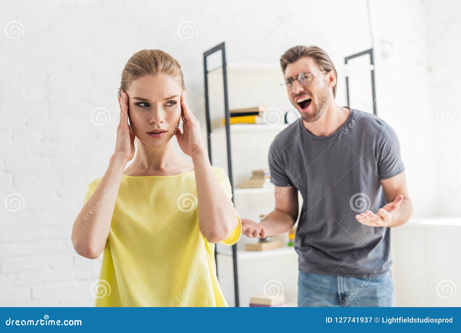 Young Man Screaming at Girlfriend while she Touching Her Stock Image ...