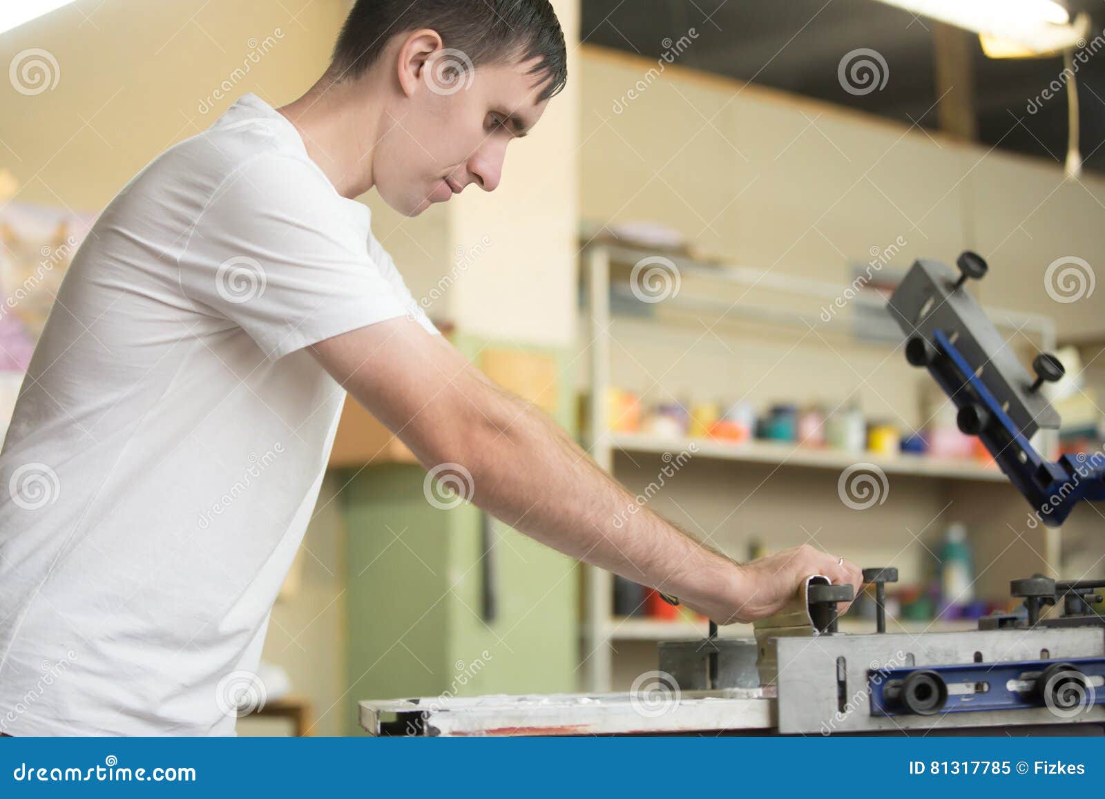 Young man screen printing stock image. Image of male - 81317785