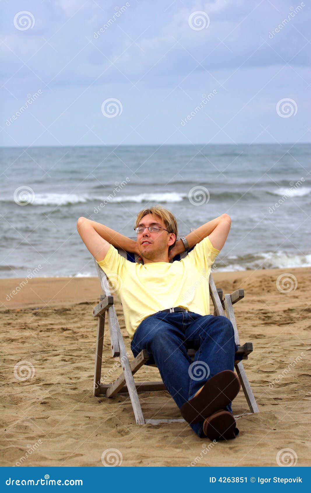 Young man on sea beach stock image. Image of sand, pleasure - 4263851