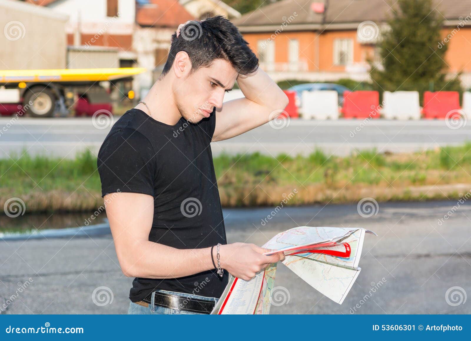 Young Man Searching for a Location from Printed Stock Image - Image of ...