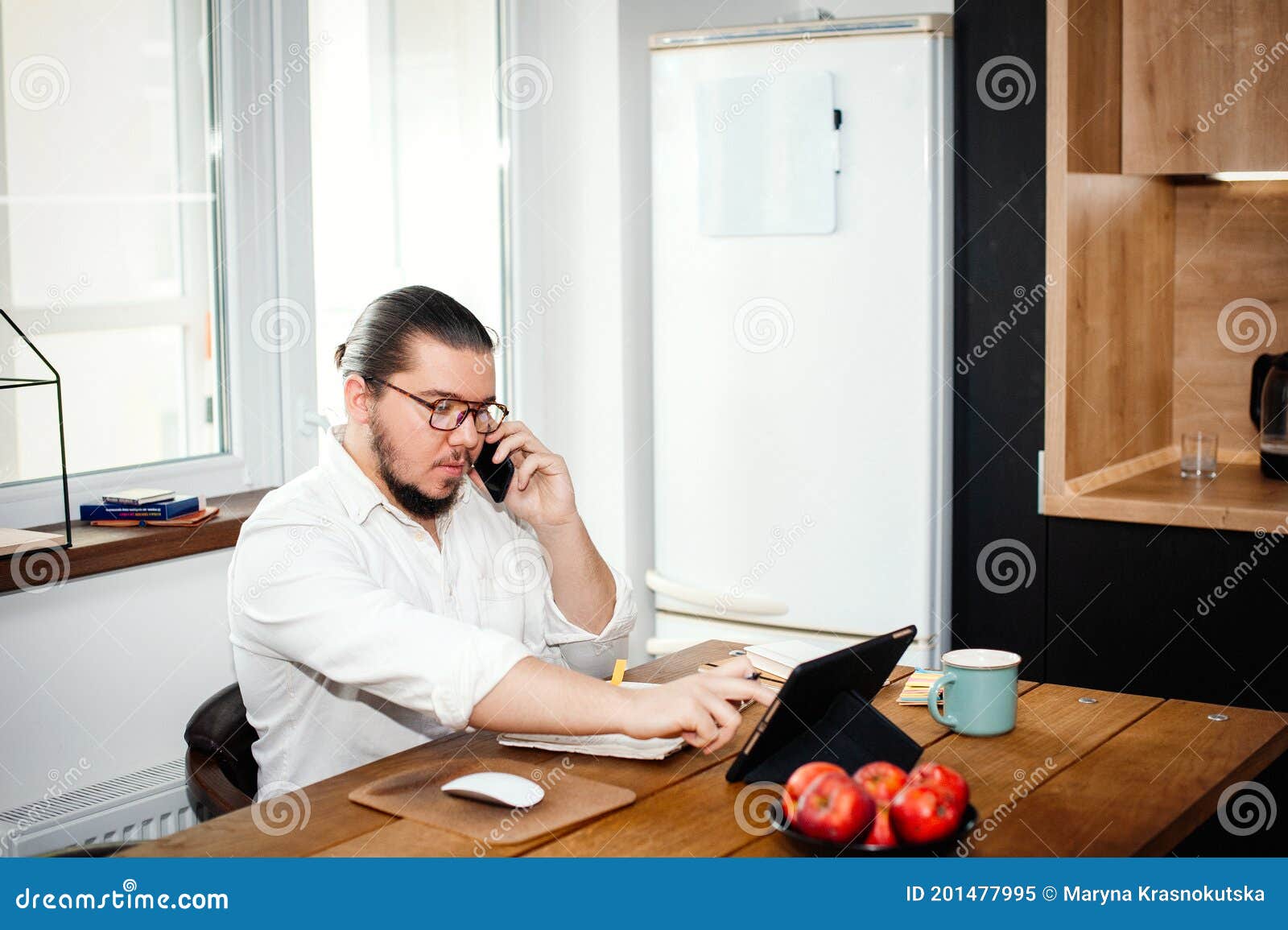 Young Man during Self-isolation Works in the Kitchen at Home Stock ...