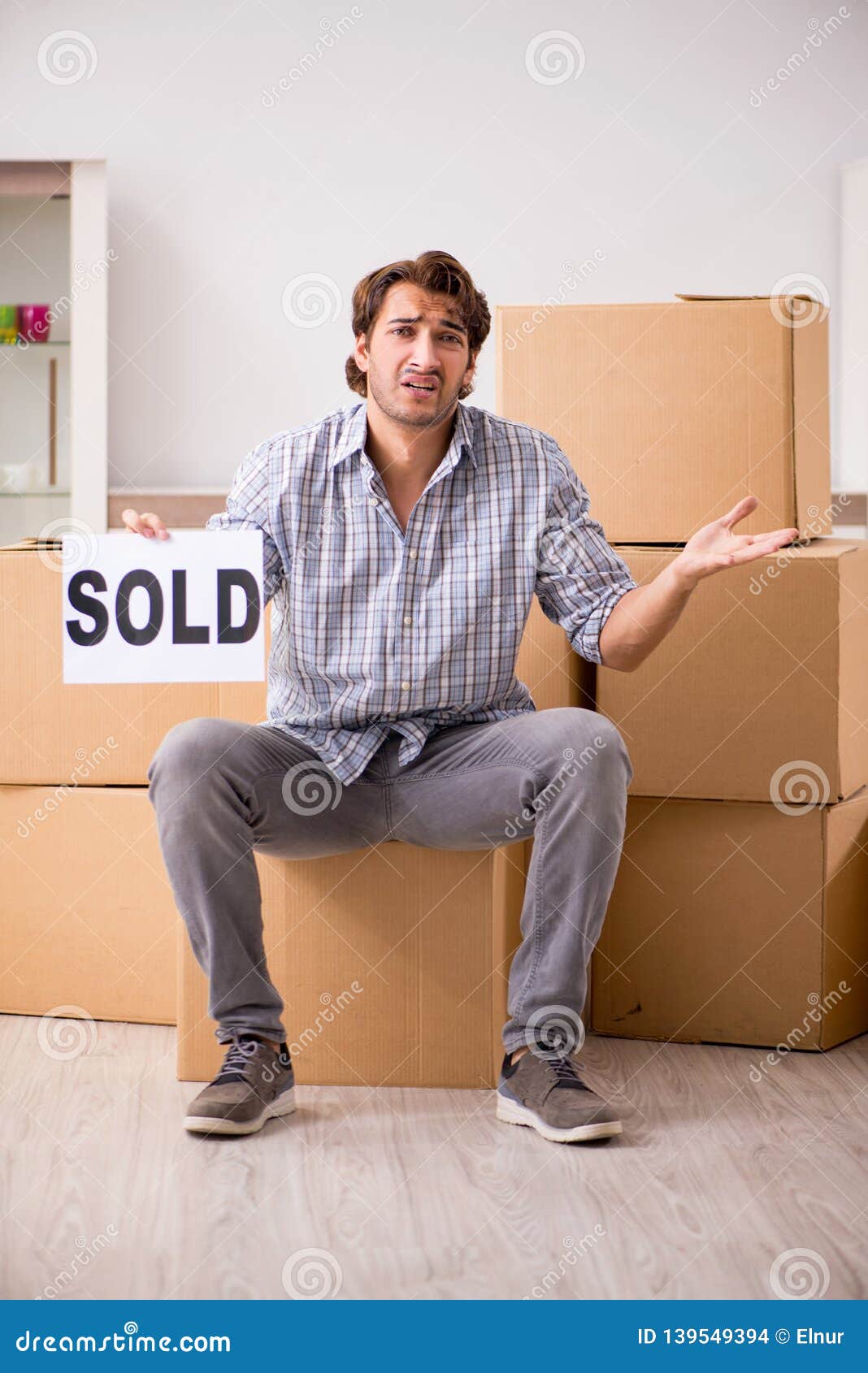 The Young Man Selling His House Stock Photo - Image of boxes, packaging ...