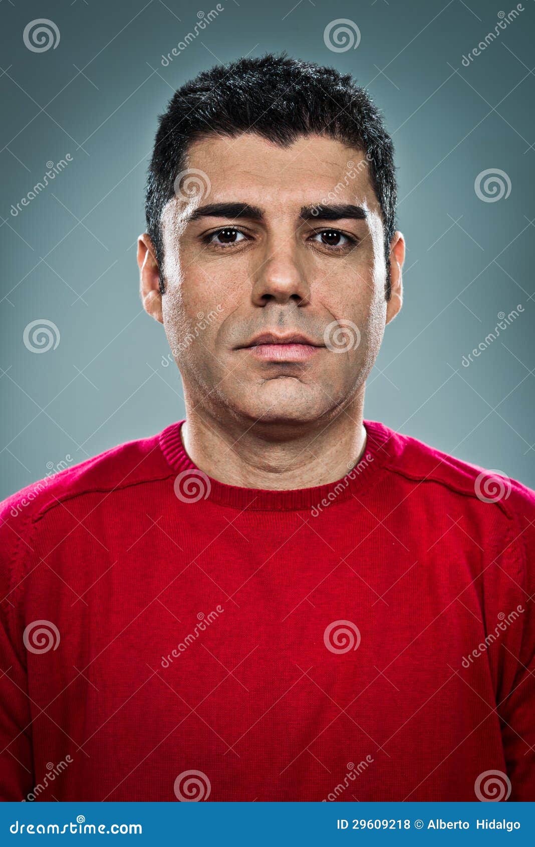 Young Man with Serious Expression Stock Photo - Image of portrait ...