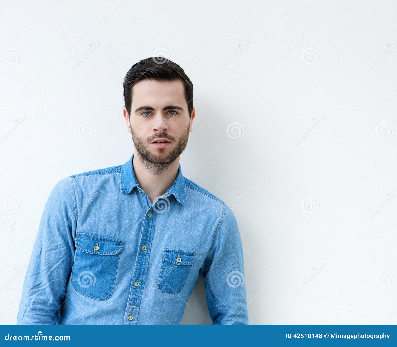 Young Man with Serious Expression Stock Photo - Image of handsome, male ...