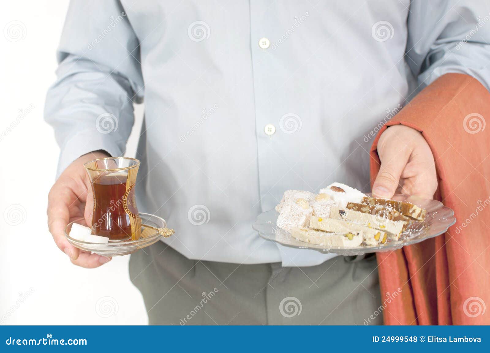 Young Man Serving Turkish Chai and Sweets Stock Photo - Image of ...