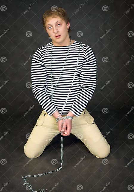 Young man shackled stock photo. Image of sailor, fetter - 9109902