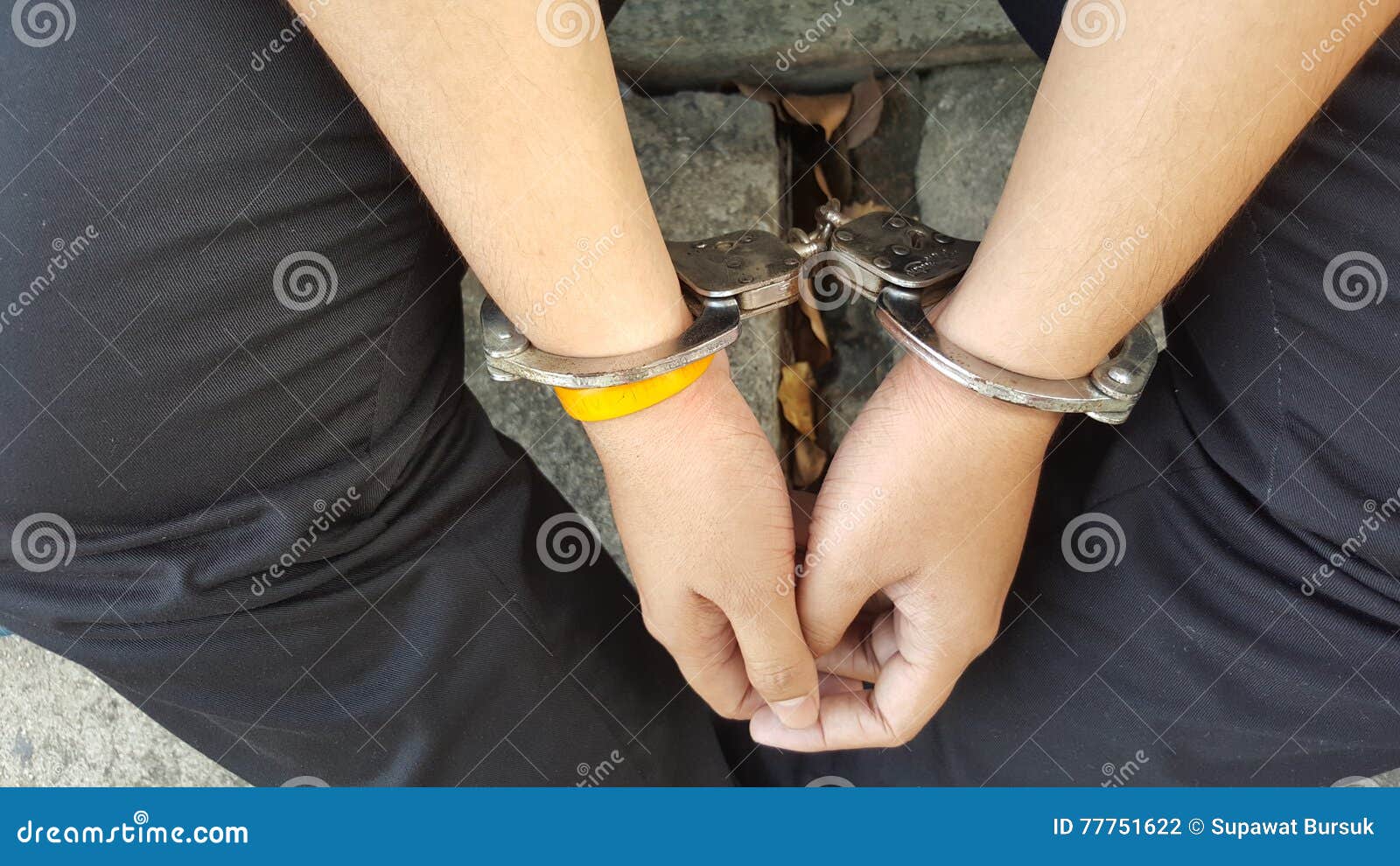 A young man in shackles stock photo. Image of security - 77751622