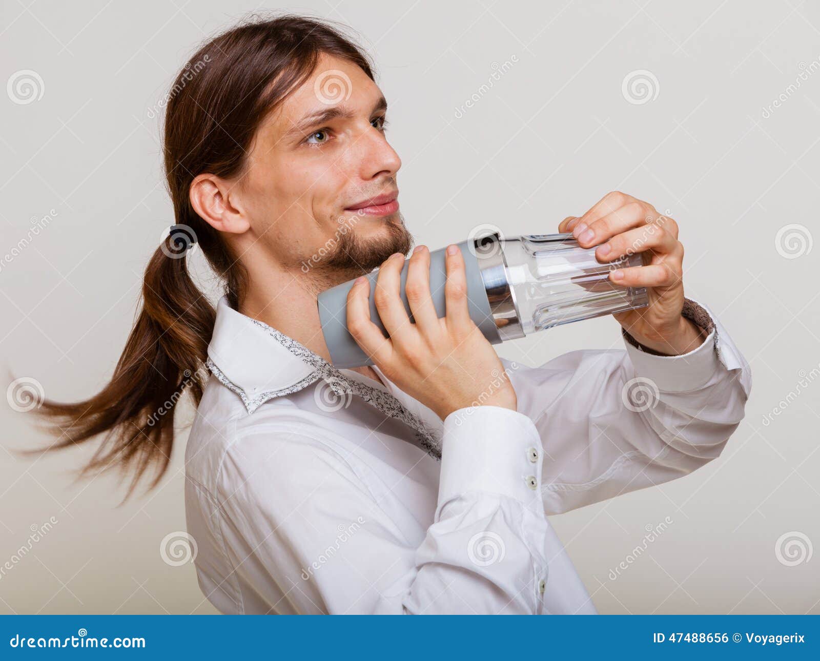 Young Man with Shaker Making Cocktail Drink Stock Photo - Image of ...