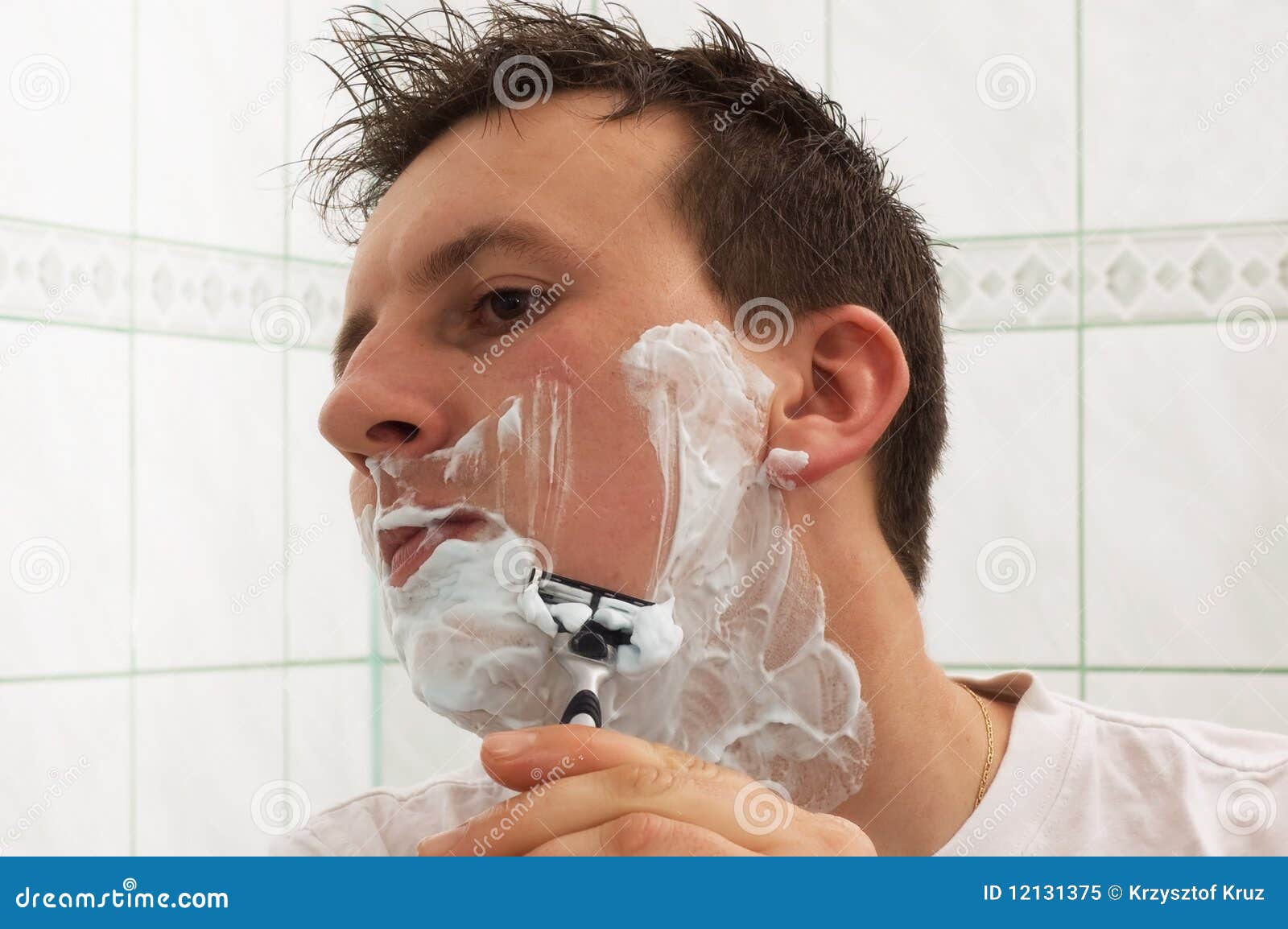 Young man is shaving stock image. Image of refreshment - 12131375
