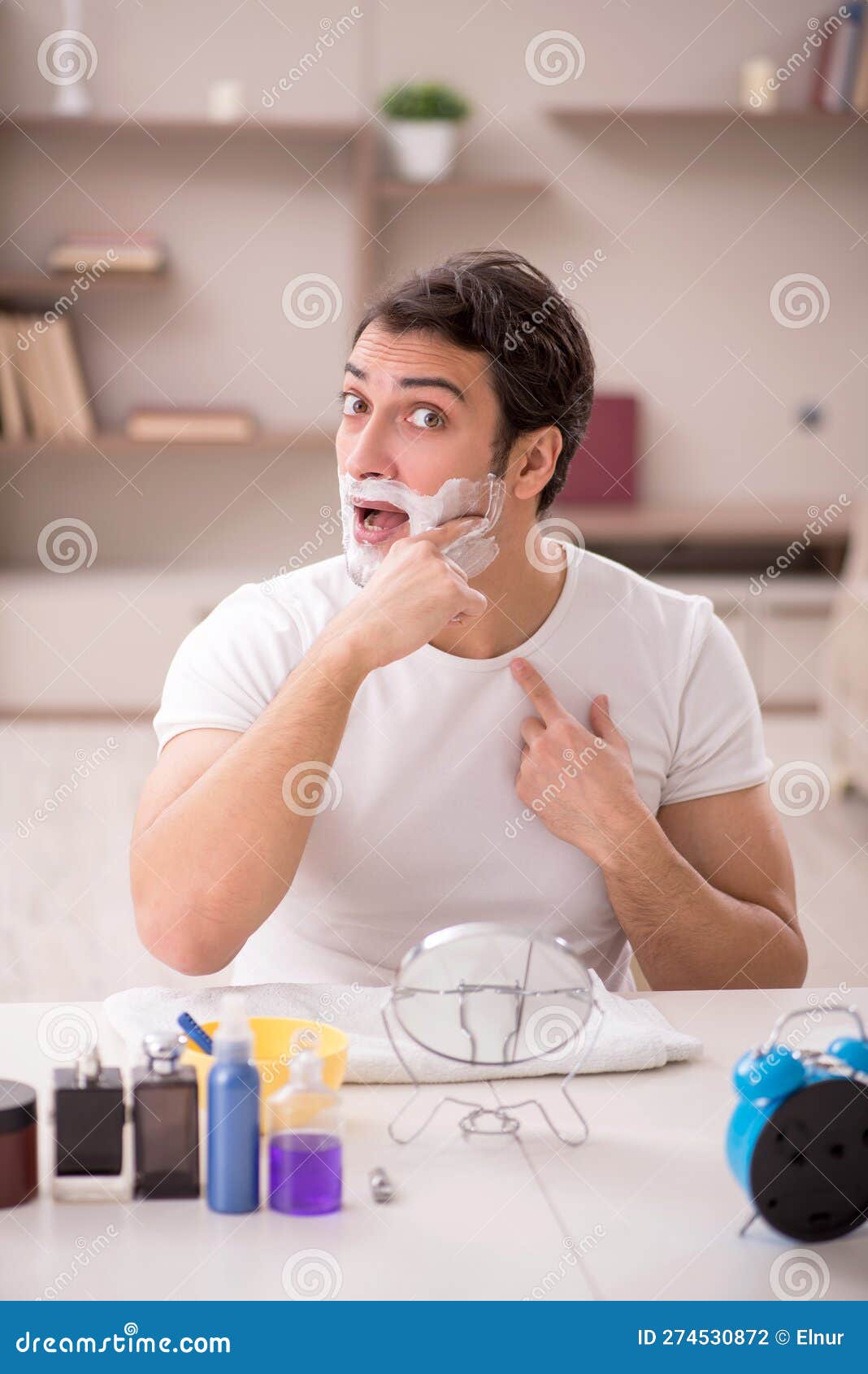 Young Man Shaving Face at Home Stock Photo - Image of bathroom, hair ...