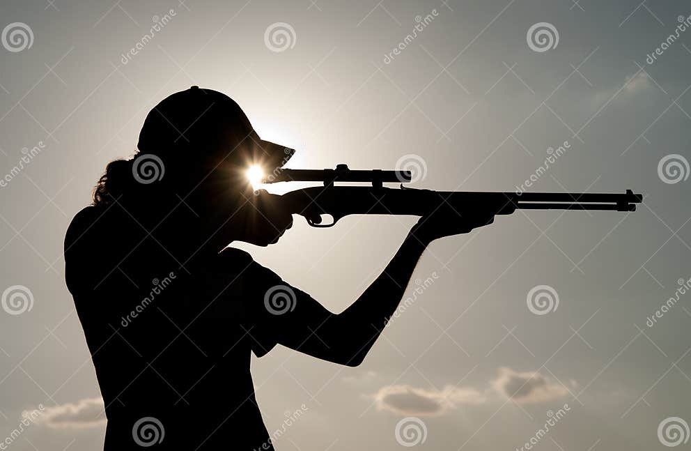 Young Man Shooting with a Rifle Stock Photo - Image of armed, nature ...