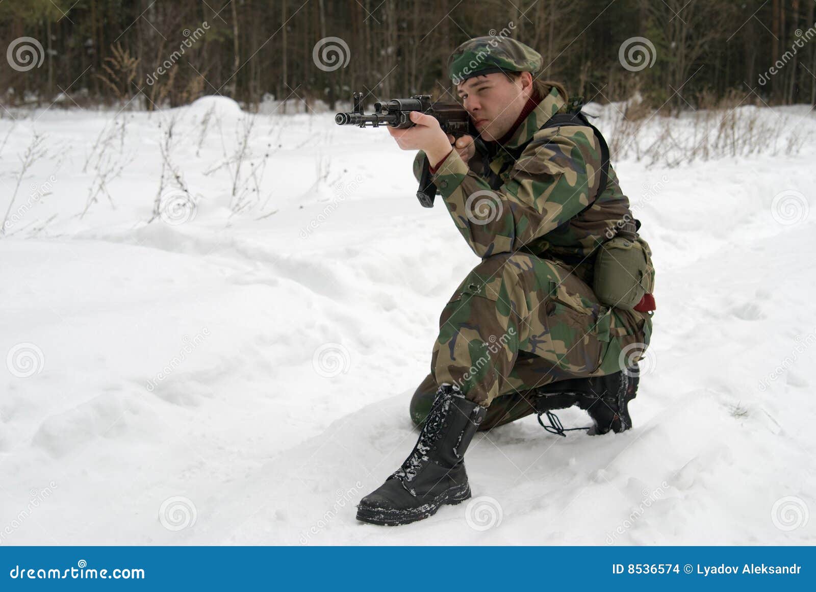 A Young Man Shoots from the Automat of Kalashnikov Stock Photo - Image ...