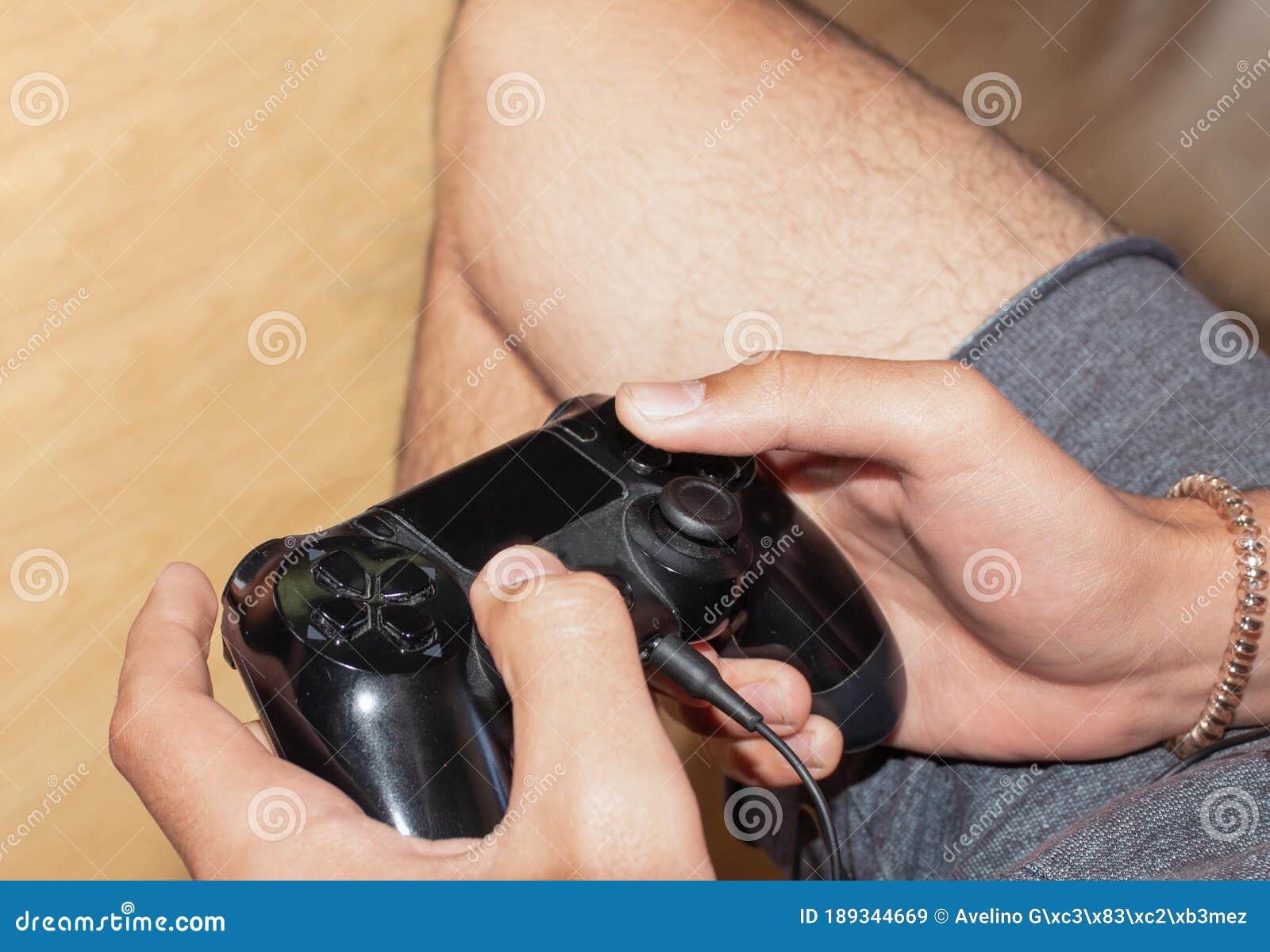 Playing with the Remote Control of the Videoconsole Stock Image - Image ...