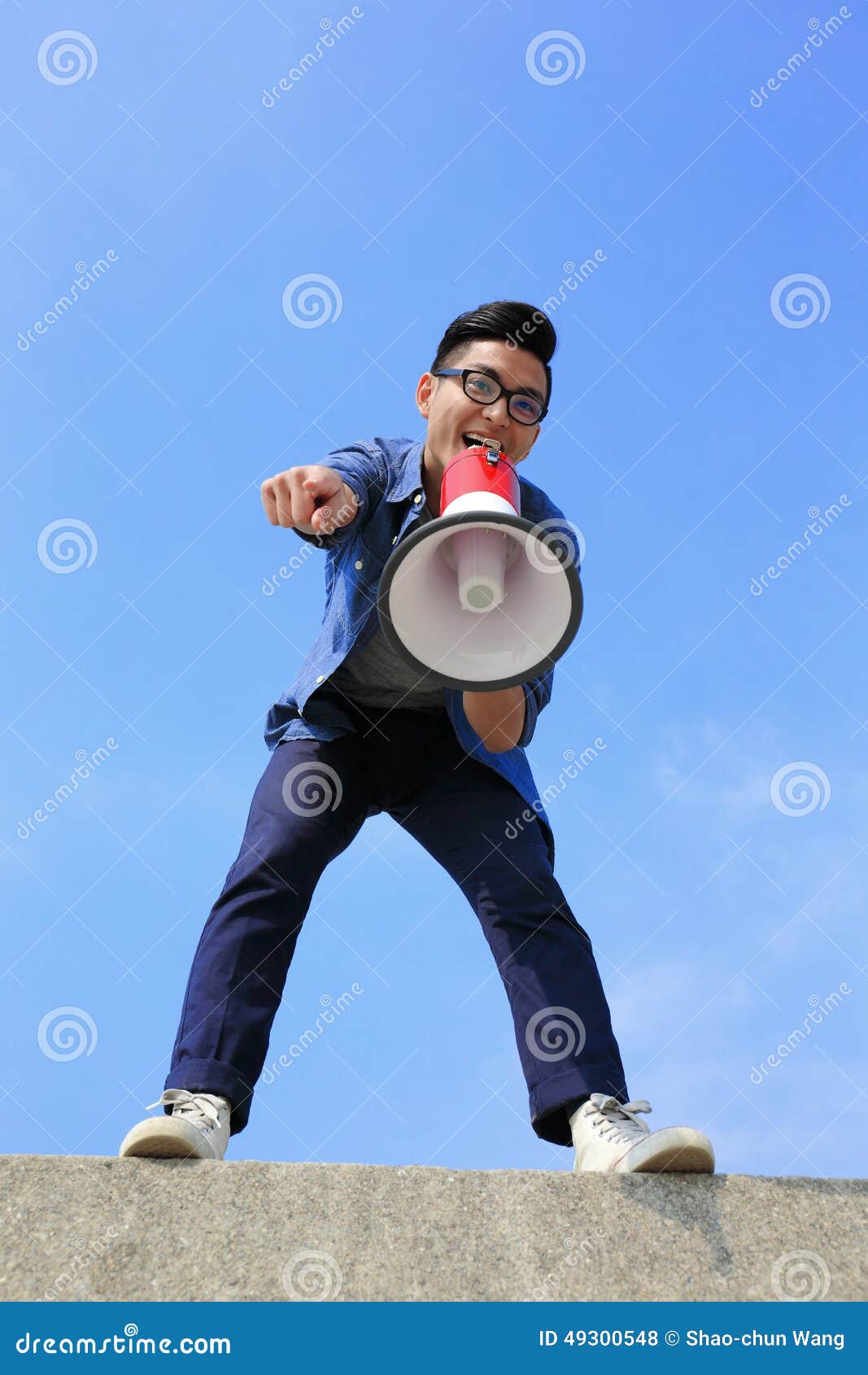 Young man shout megaphone stock photo. Image of chinese - 49300548
