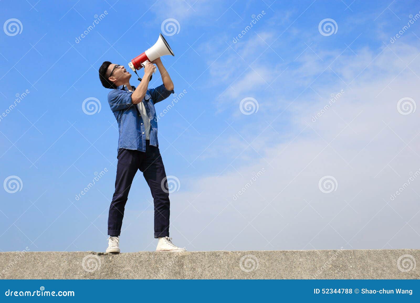 Young man shout megaphone stock photo. Image of lifestyle - 52344788