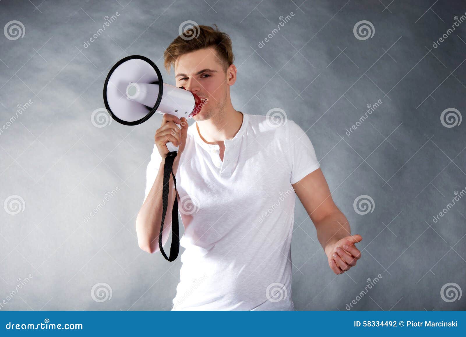 Young Man Shouting in Megaphone. Stock Photo - Image of hold, energetic ...