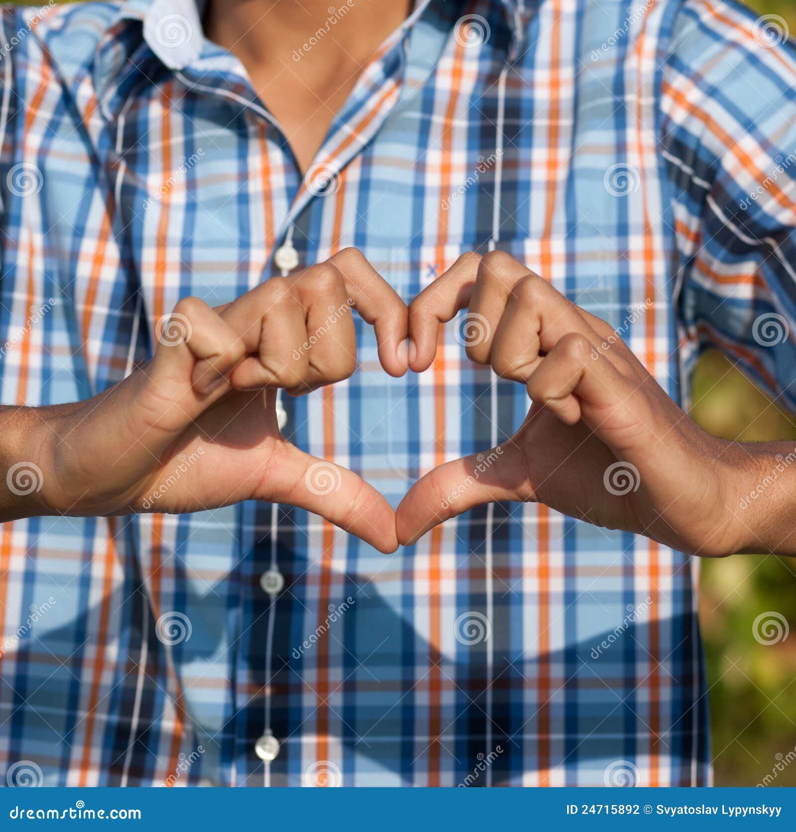 Young man show love sign stock photo. Image of happiness - 24715892