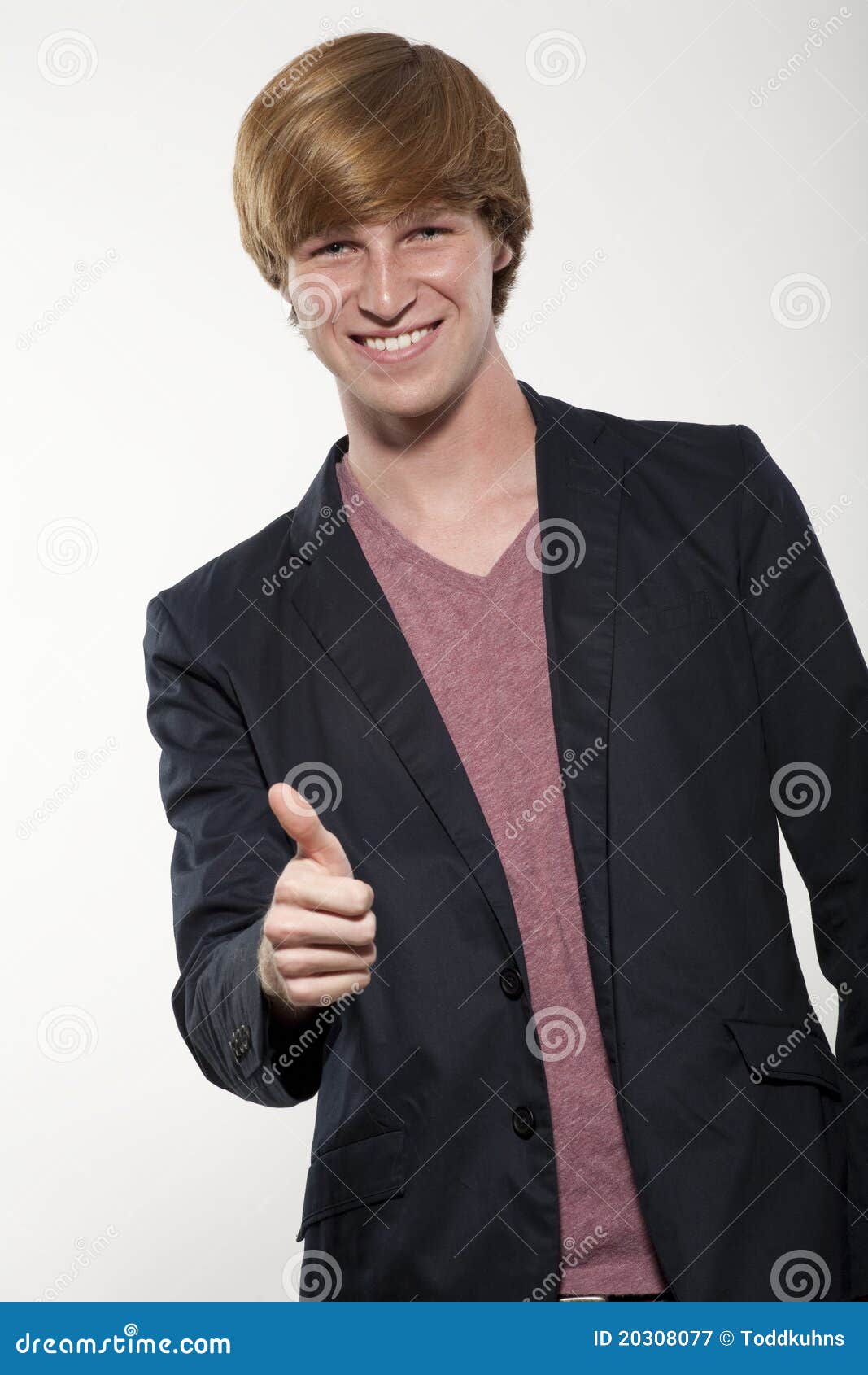 Young Man Showing Approval stock image. Image of gesturing - 20308077