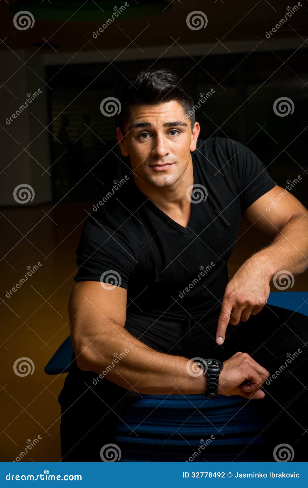 Young Man Showing on the Clock, it S Time To Train Stock Photo - Image ...