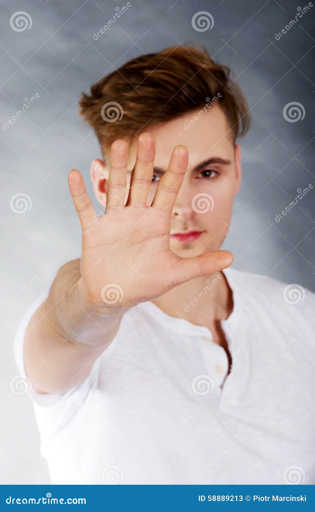 Young Man Showing Stop Sign. Stock Image - Image of gesture, face: 58889213