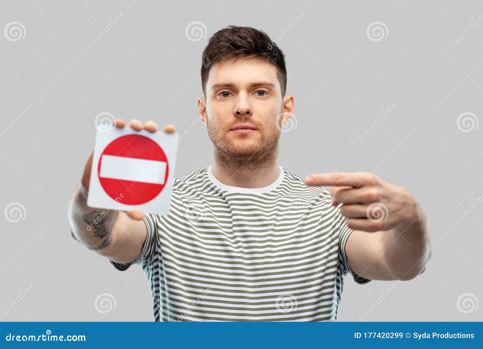 Young Man Showing Stop Sign Stock Image - Image of sign, halt: 177420299
