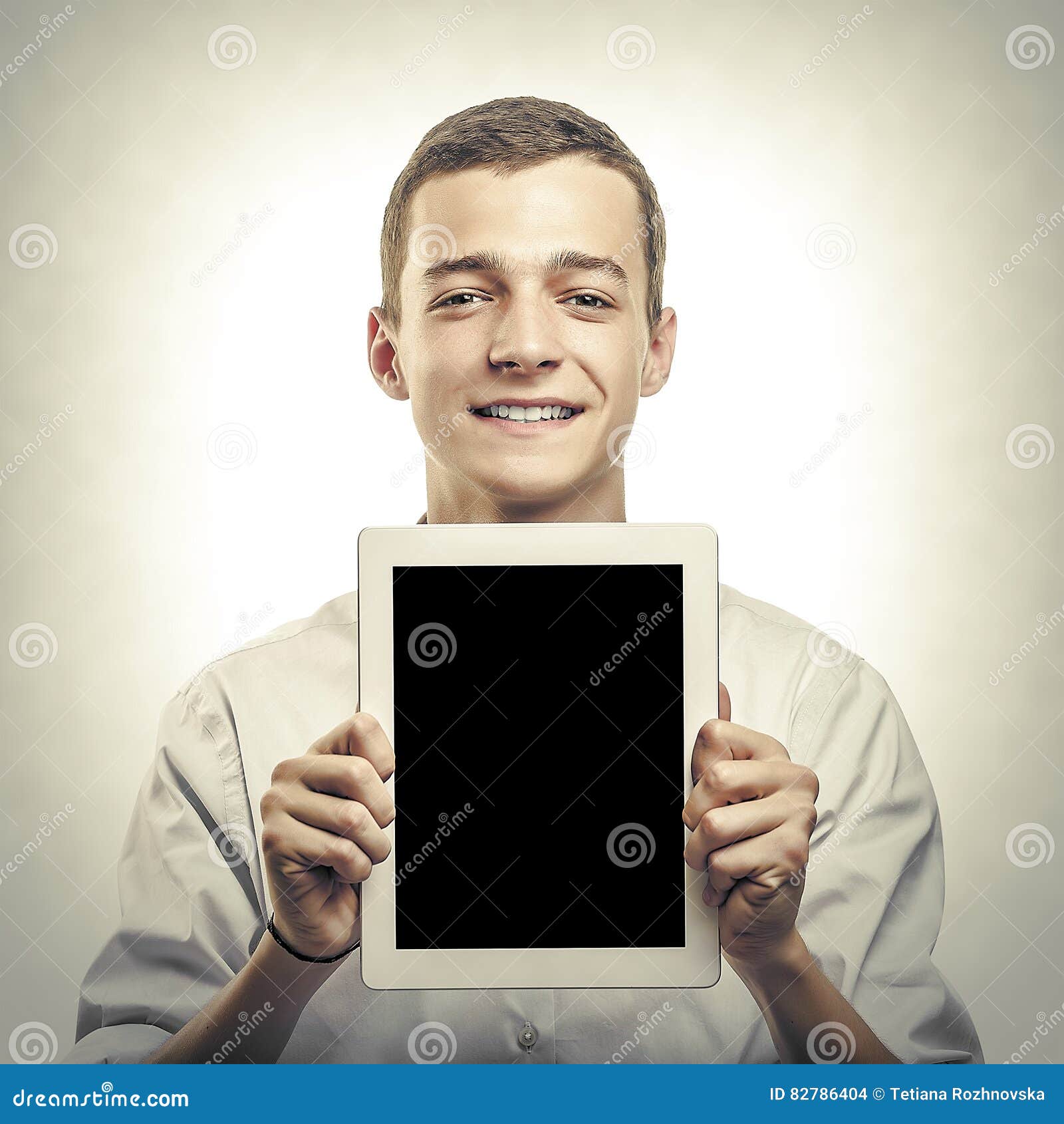 Young Man Showing Tablet Pc. Stock Photo - Image of mobile, portrait ...