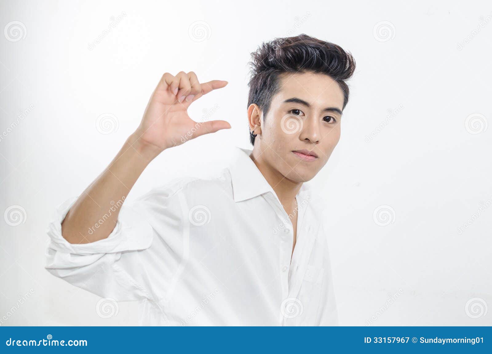 Young Man Showing Us Something Stock Image - Image of looking, camera ...