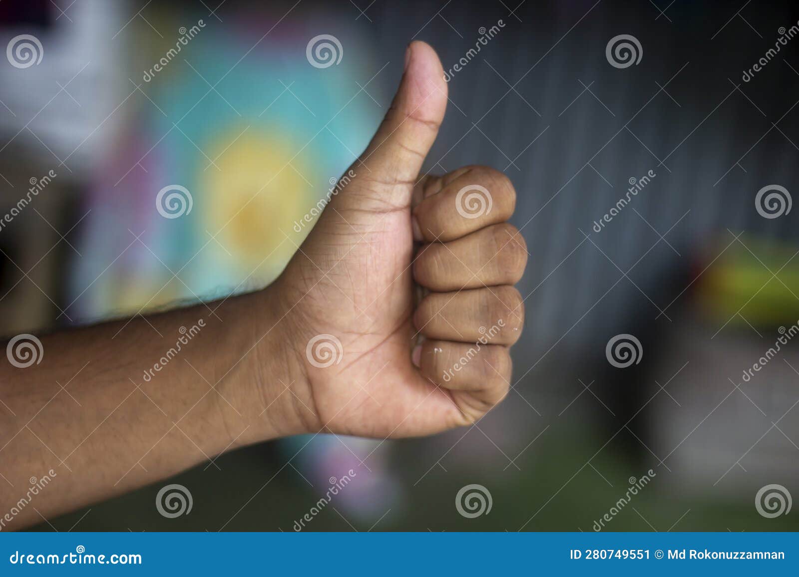 A Young Man Shows His Hand with Like Style and Background Blur Stock ...