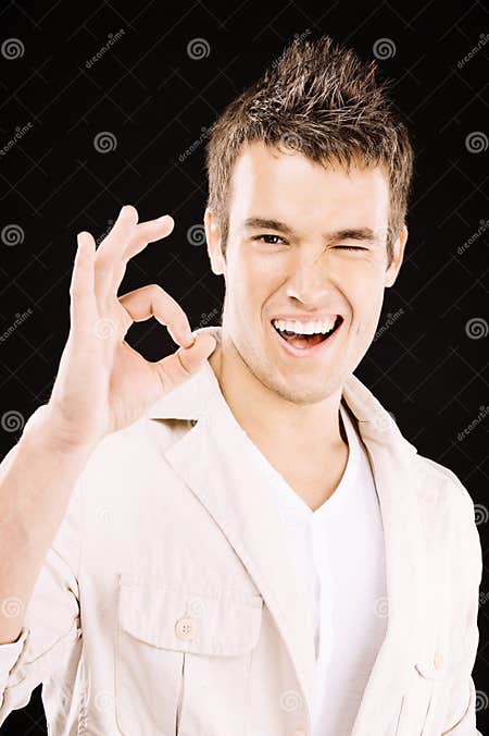Young man shows sign OK stock image. Image of confident - 17009625