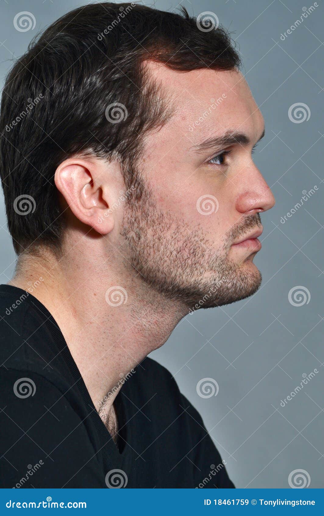 Young man with a side view stock image. Image of masculine - 18461759