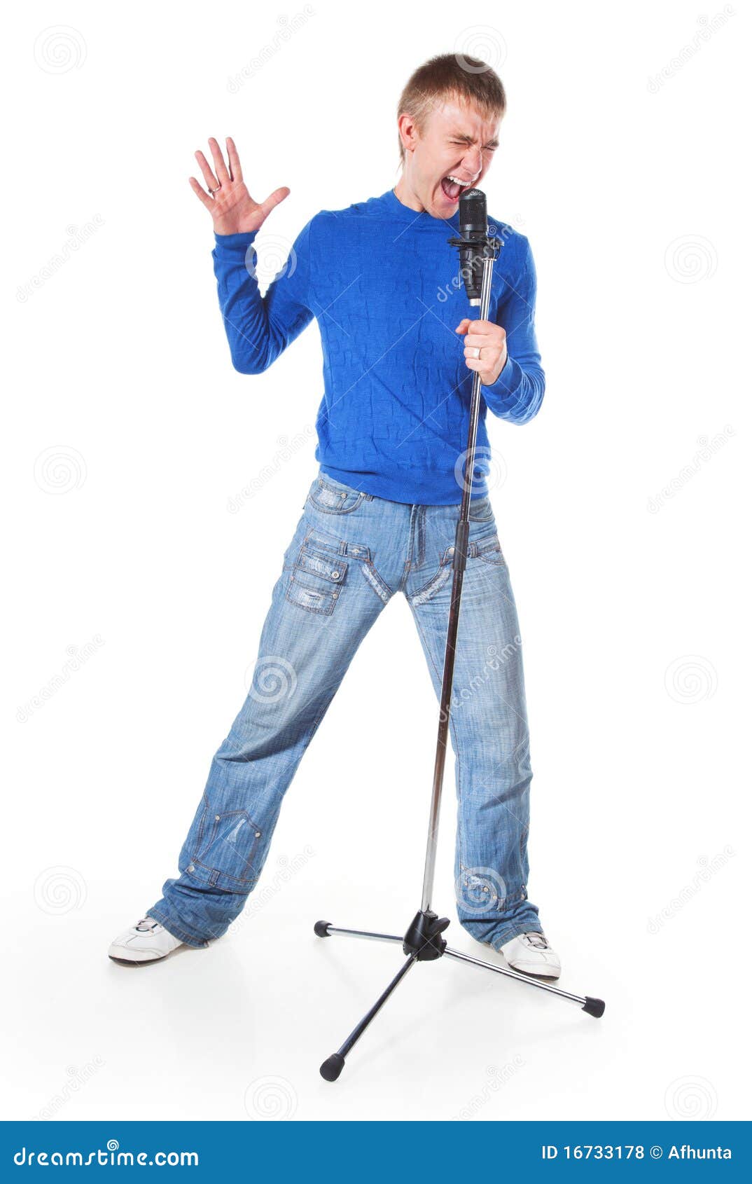 A young man singing stock photo. Image of blue, adult - 16733178