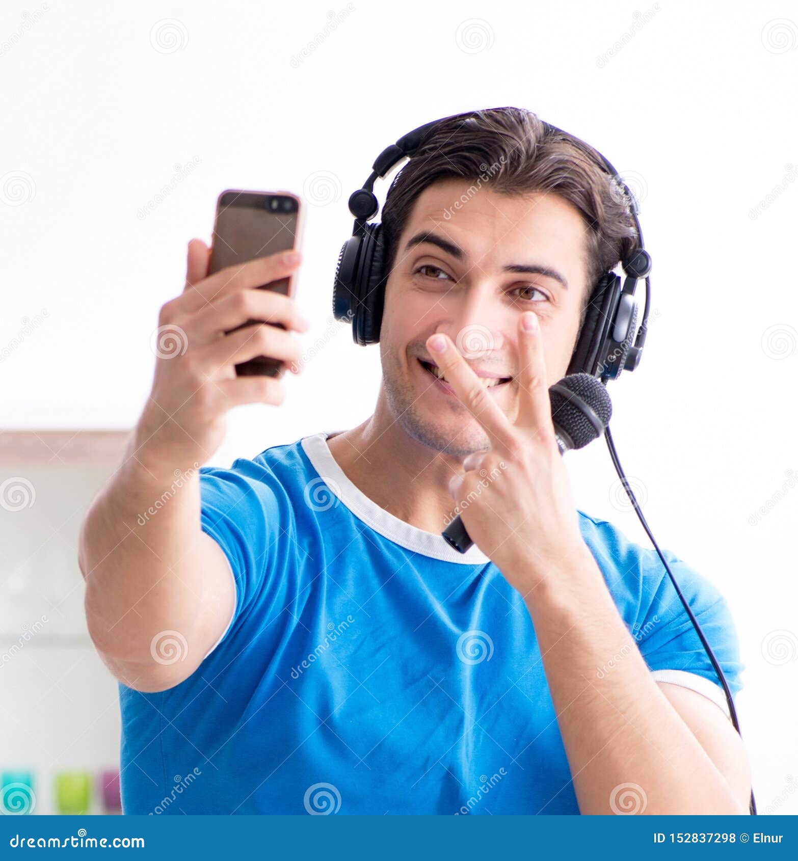 Young Man Singing at Home Karaoke Stock Photo - Image of earphones ...