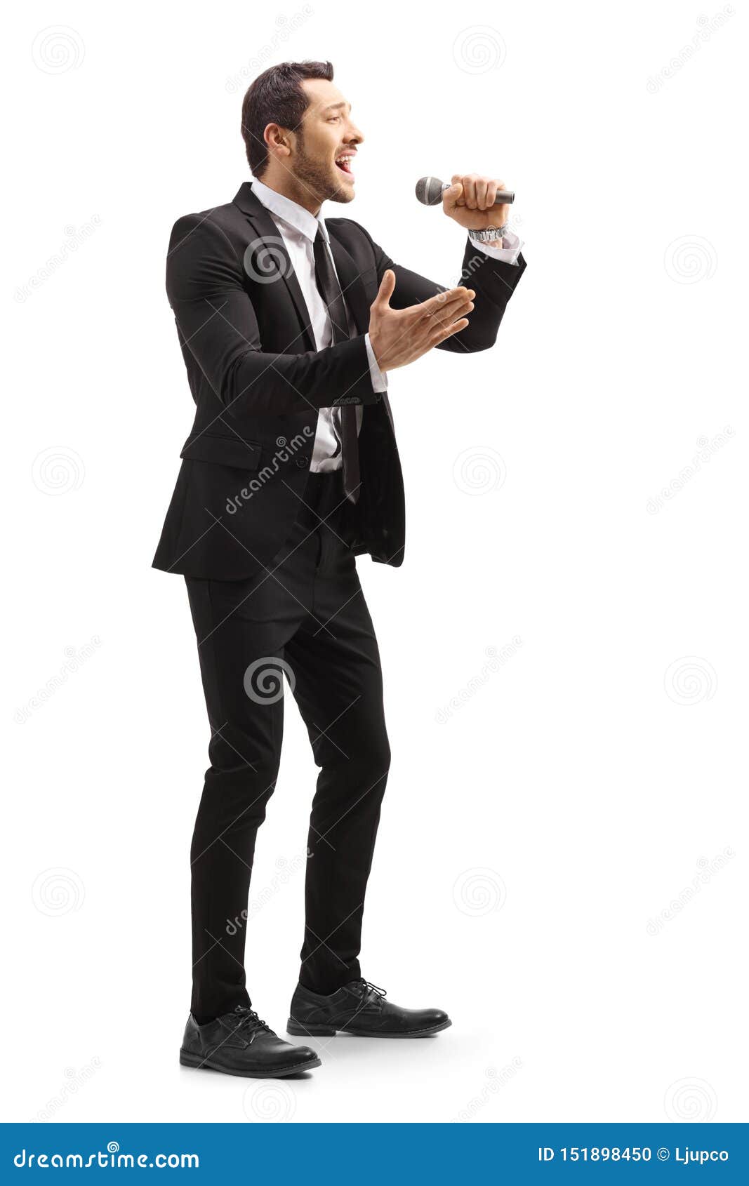 Young Man Singing on a Microphone Stock Photo - Image of holding ...