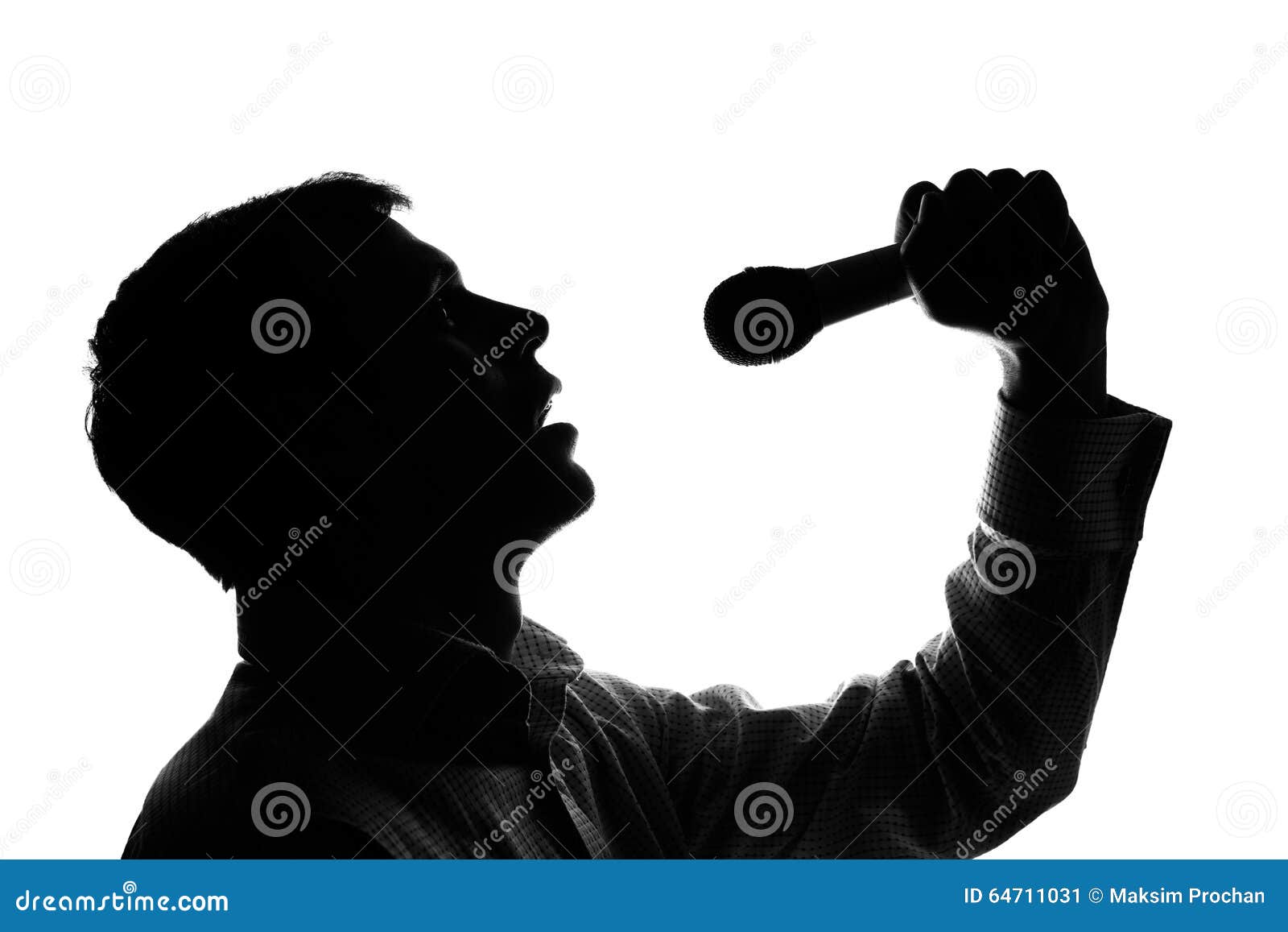 A Young Man Singing into a Microphone Stock Image - Image of music ...
