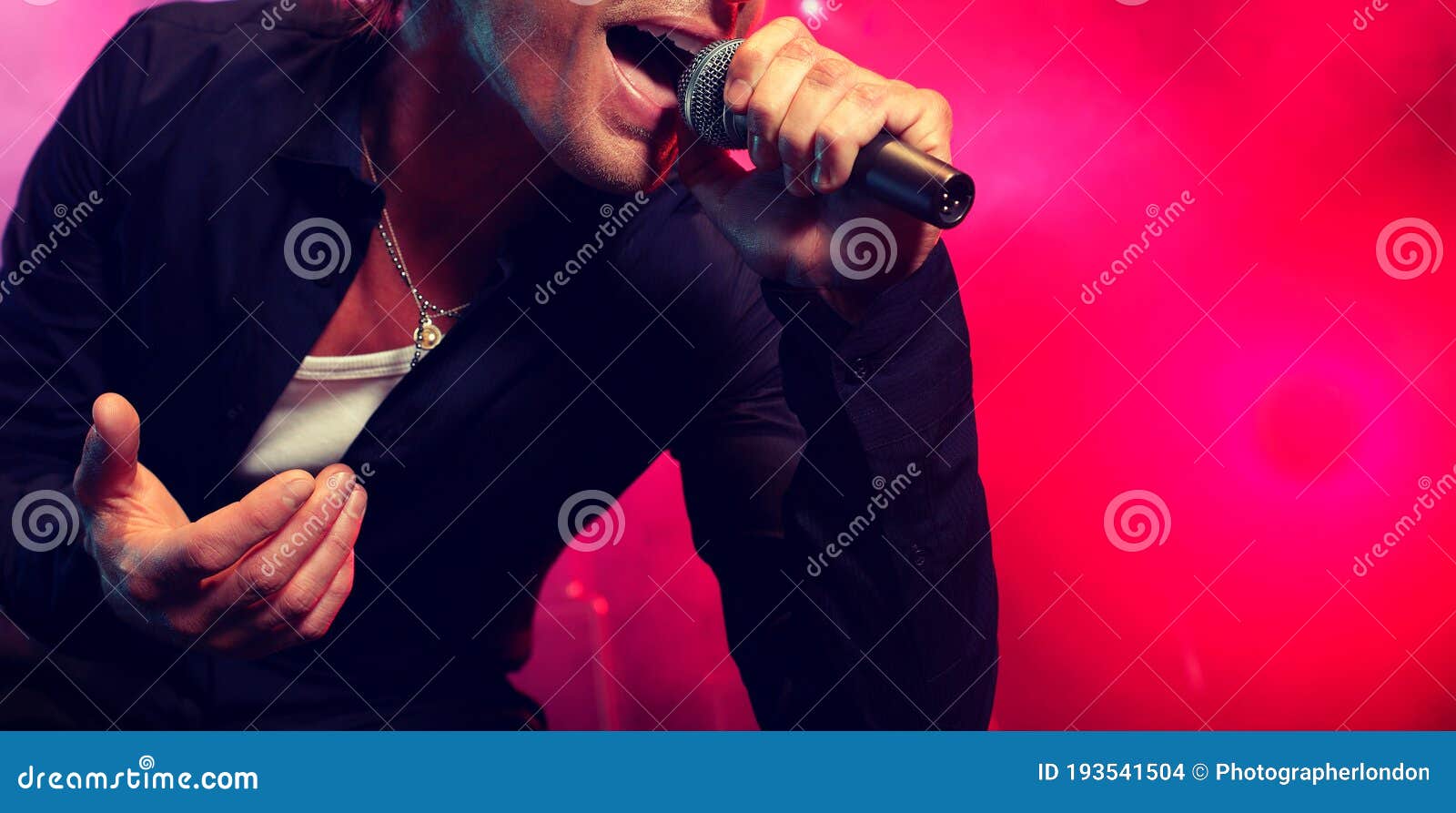 Young Man Singing at Rock Concert Stock Photo - Image of performer ...