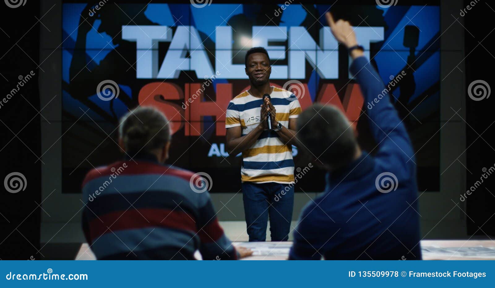 Young Man Singing at Talent Show Stock Photo - Image of singing, talent ...
