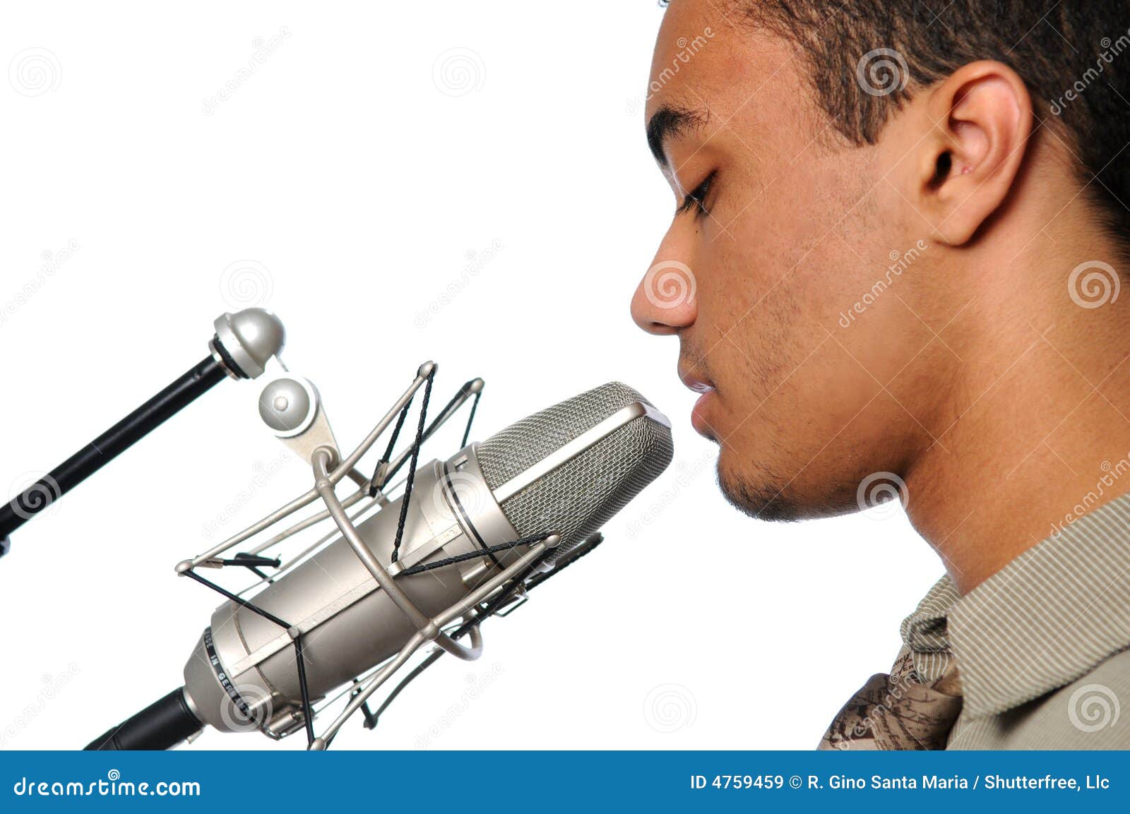 Young Man Singing into Vintage Microphone Stock Image - Image of people ...