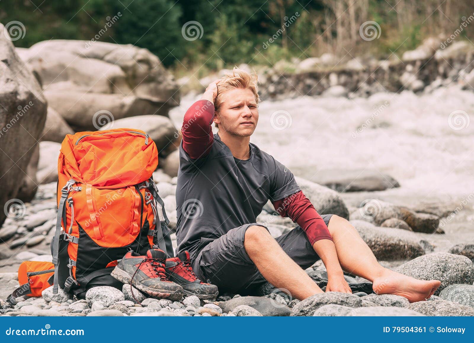 Young Man Sit Barefoot on the Mountain River Bank Stock Image - Image ...