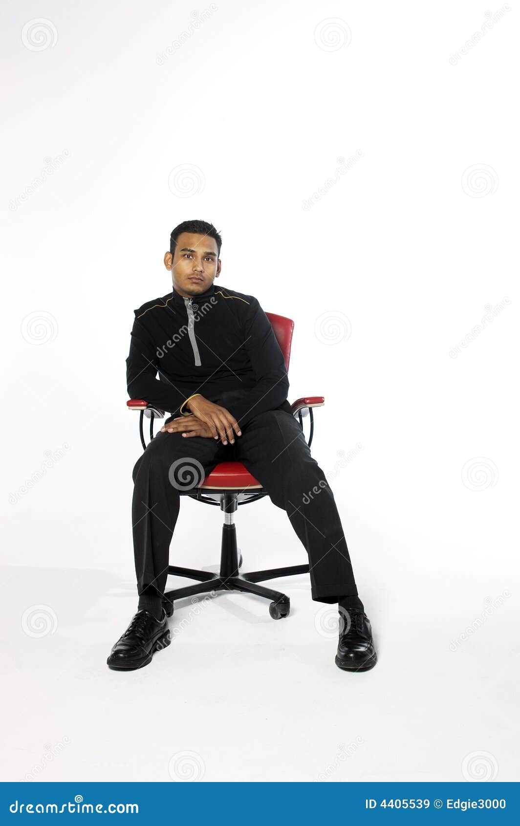 Young man sitting stock image. Image of male, shoes, chair - 4405539