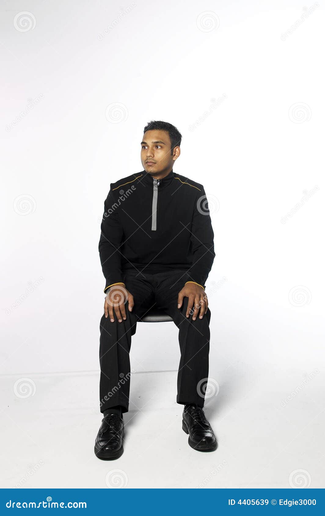 Young man sitting stock image. Image of attractive, professional - 4405639