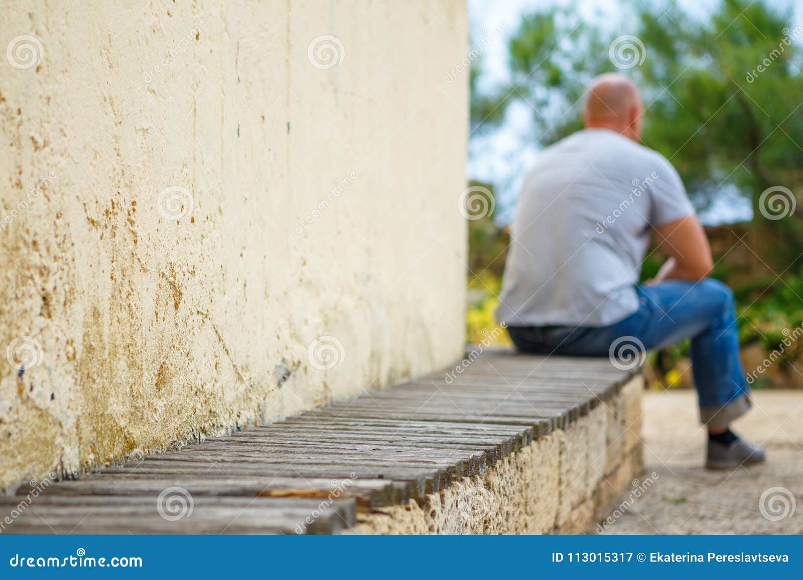 Young Man Sitting Alone on Park Bench Stock Image - Image of people ...