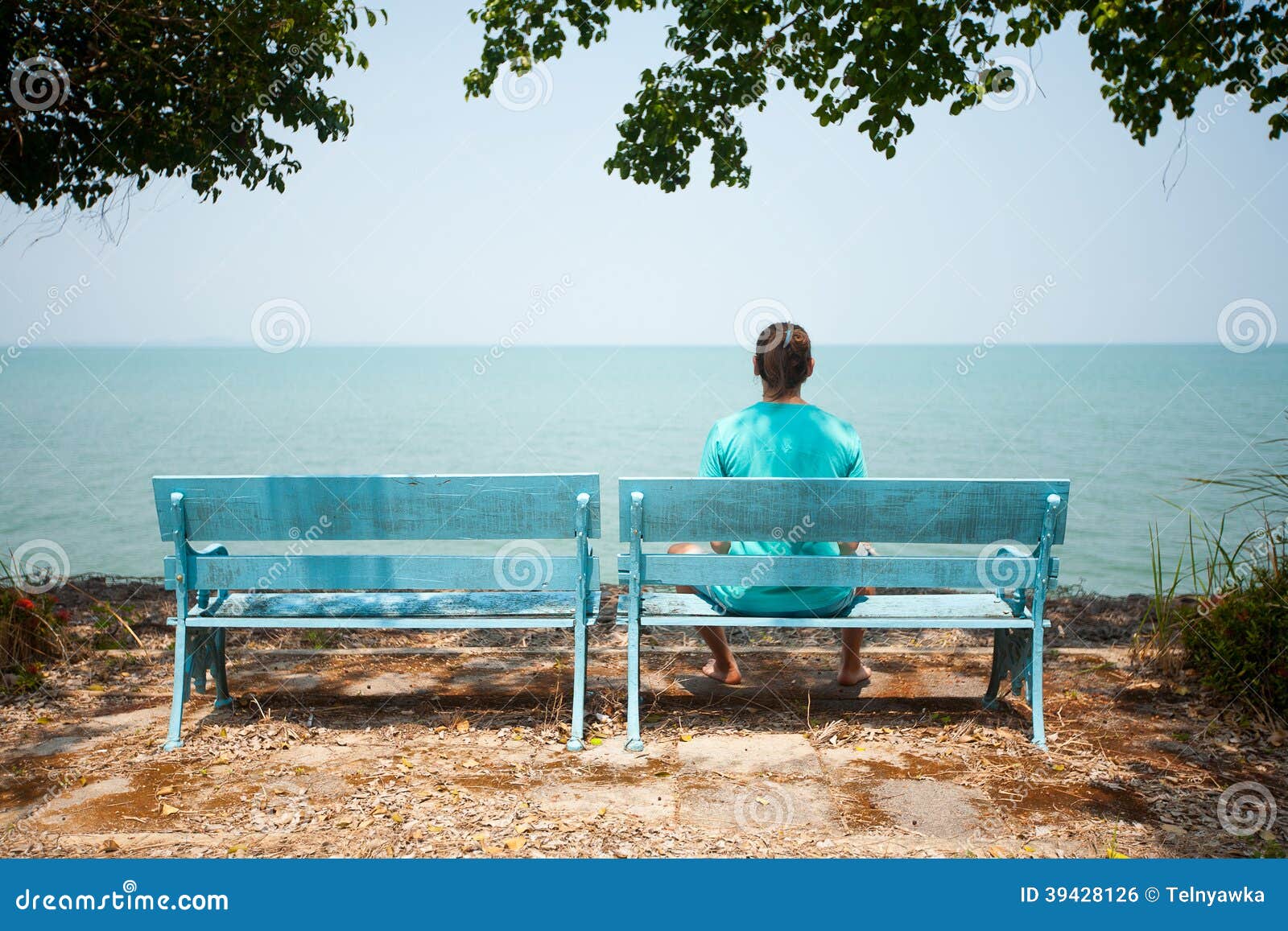 Young Man Sitting on Bench Facing the Sea Stock Photo - Image of dream ...