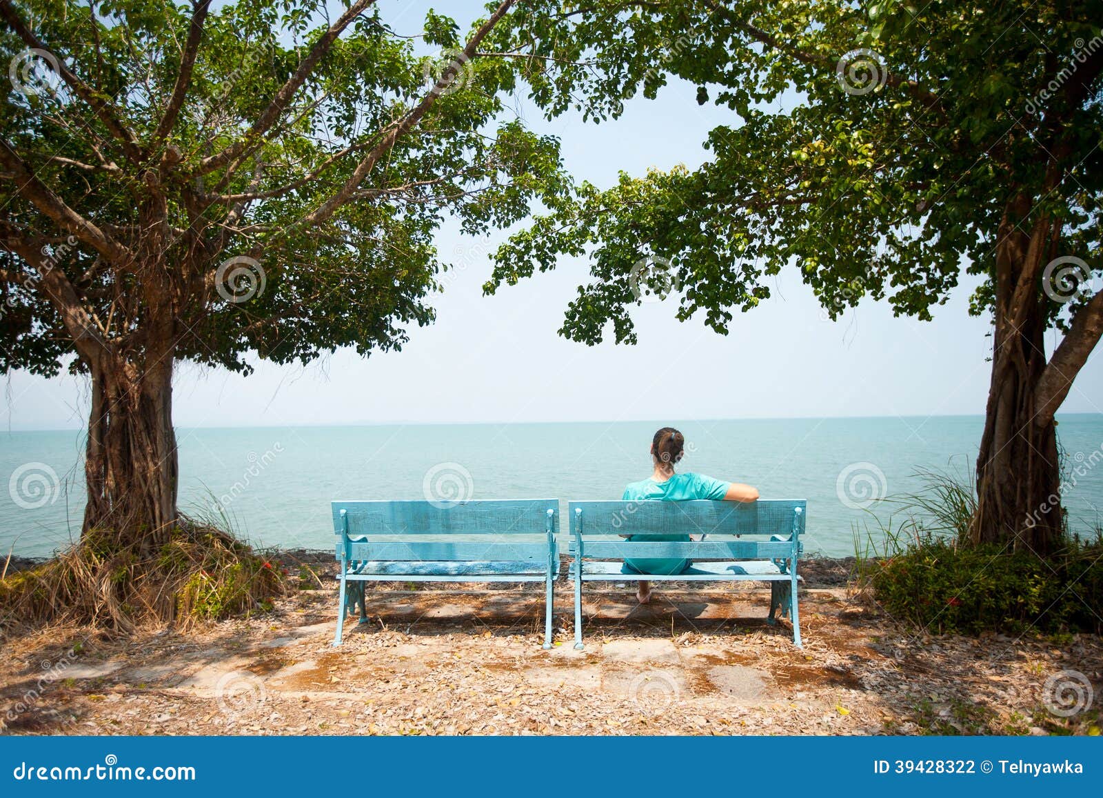 Young Man Sitting on Bench Facing the Sea Stock Photo - Image of male ...