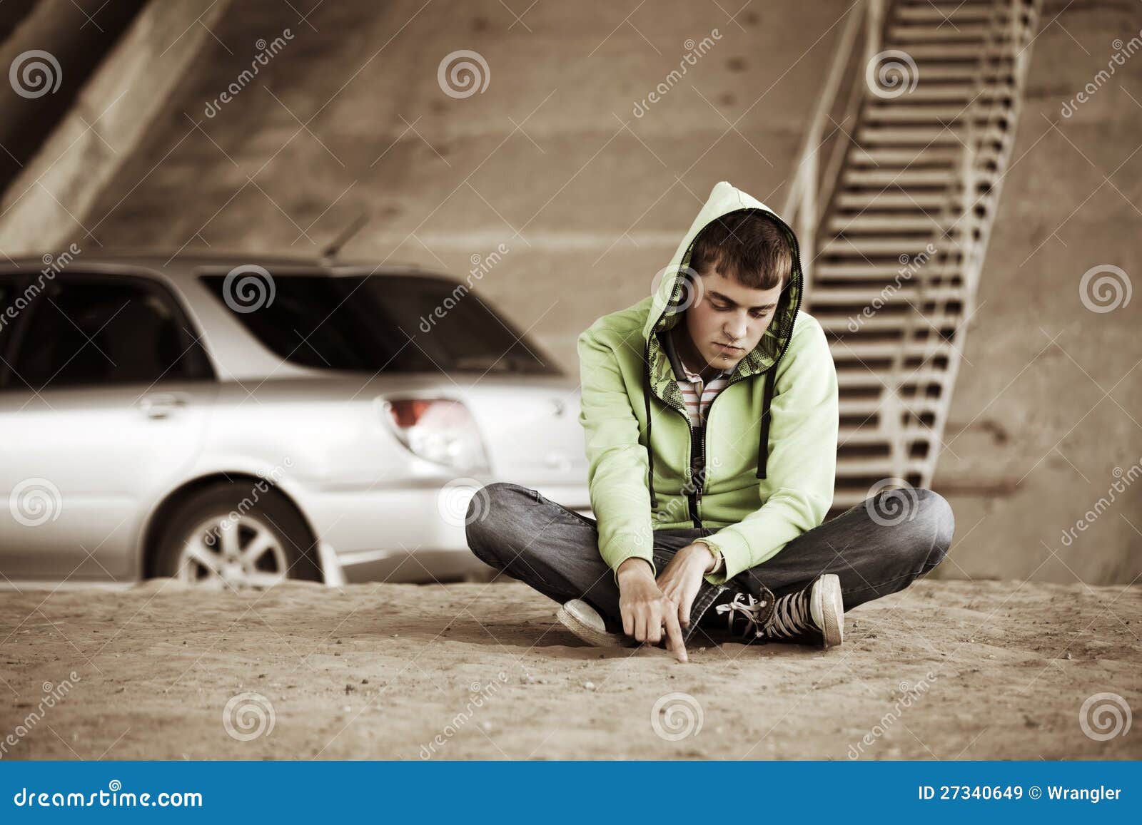 Sad Young Man Sitting on the Ground Stock Image - Image of hopelessness ...