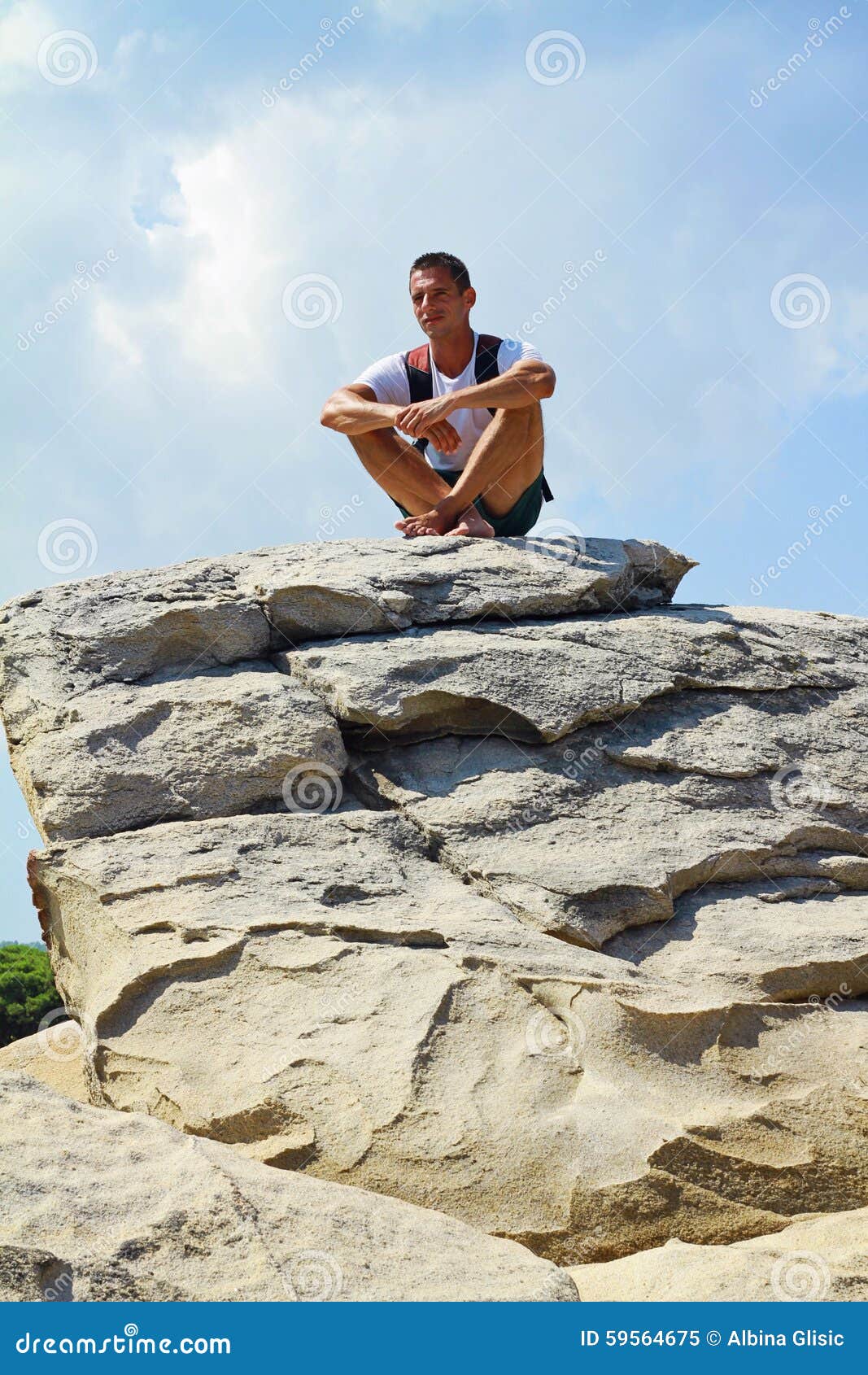 Young Man Sitting and Having a Rest on Top of a Mountain Stock Image ...