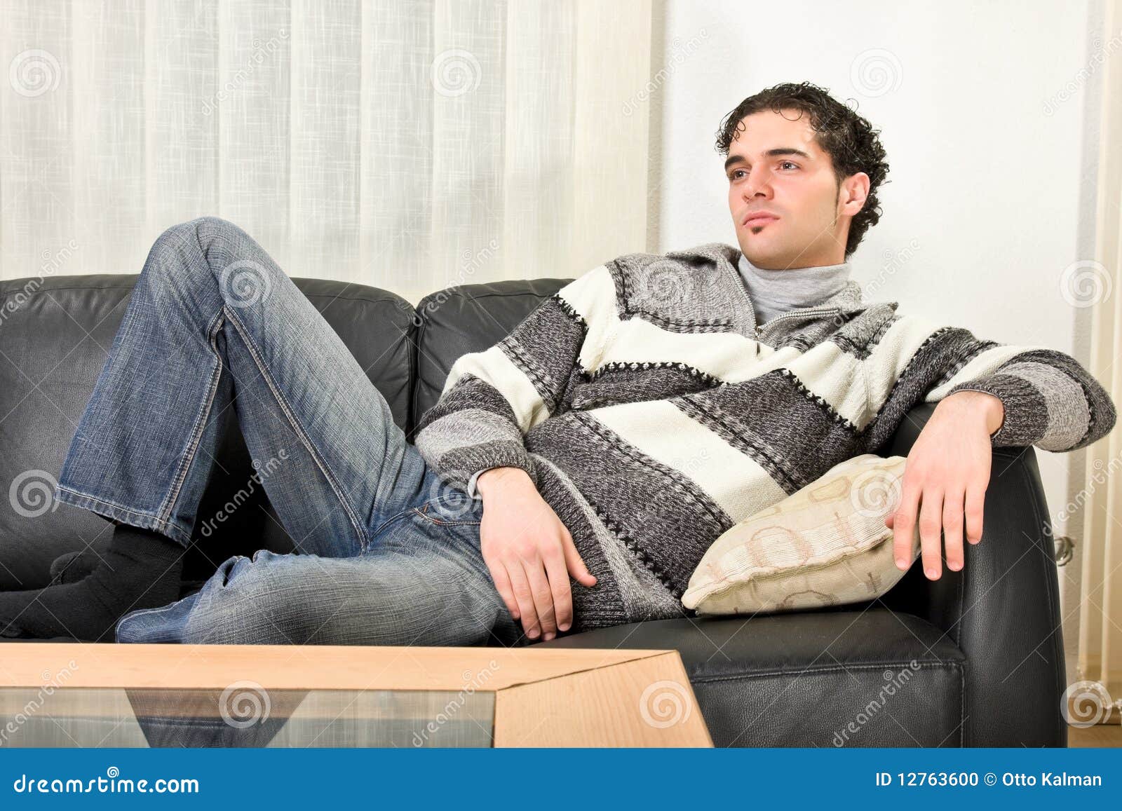 Young Man is Sitting at Home Alone Stock Photo - Image of couch ...