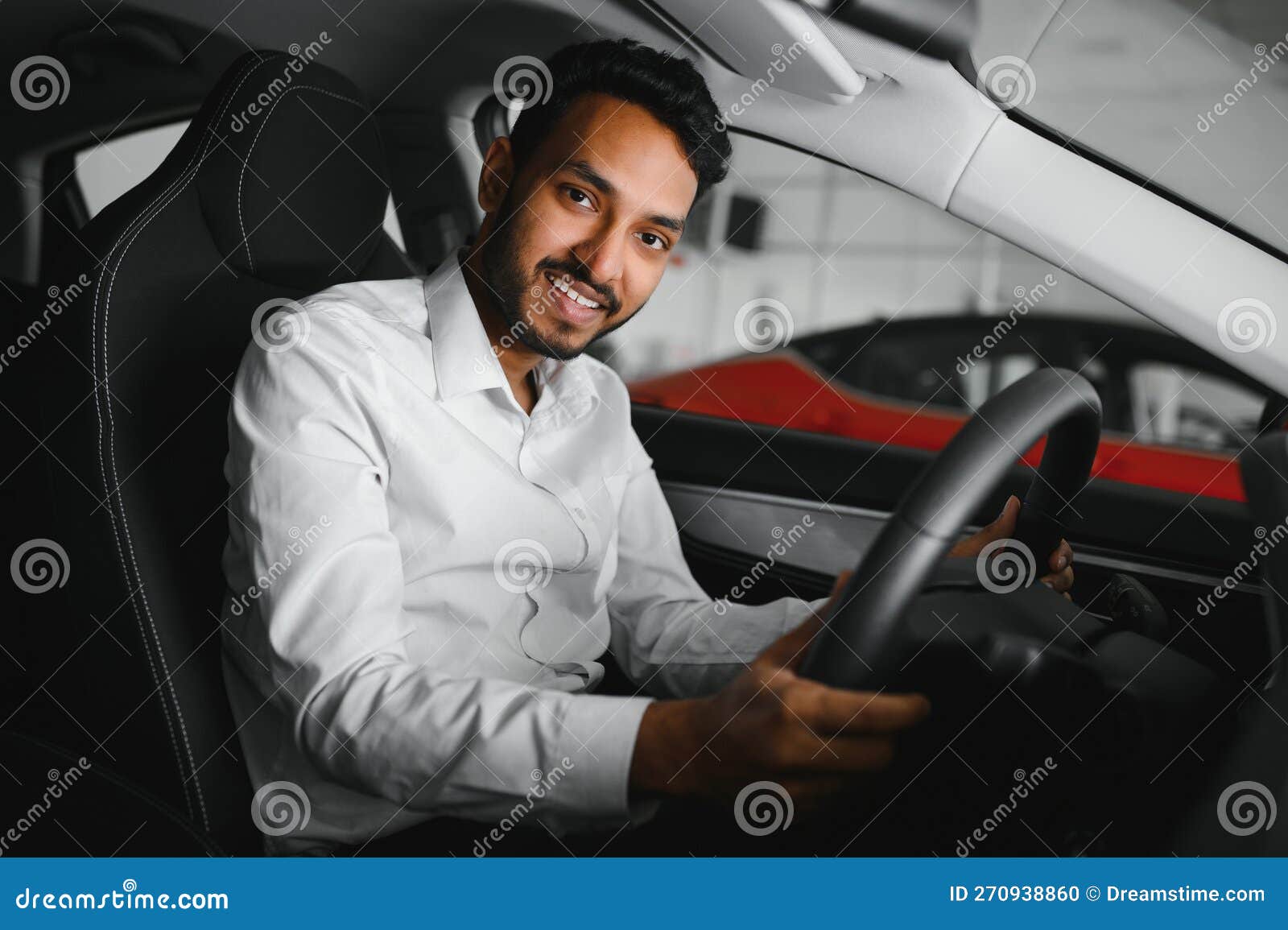 Young Man Sitting Inside New Car. Smiling Stock Photo - Image of modern ...