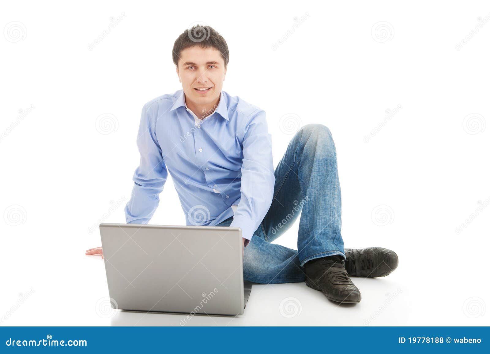 Young Man Sitting with Laptop Stock Photo - Image of sitting ...