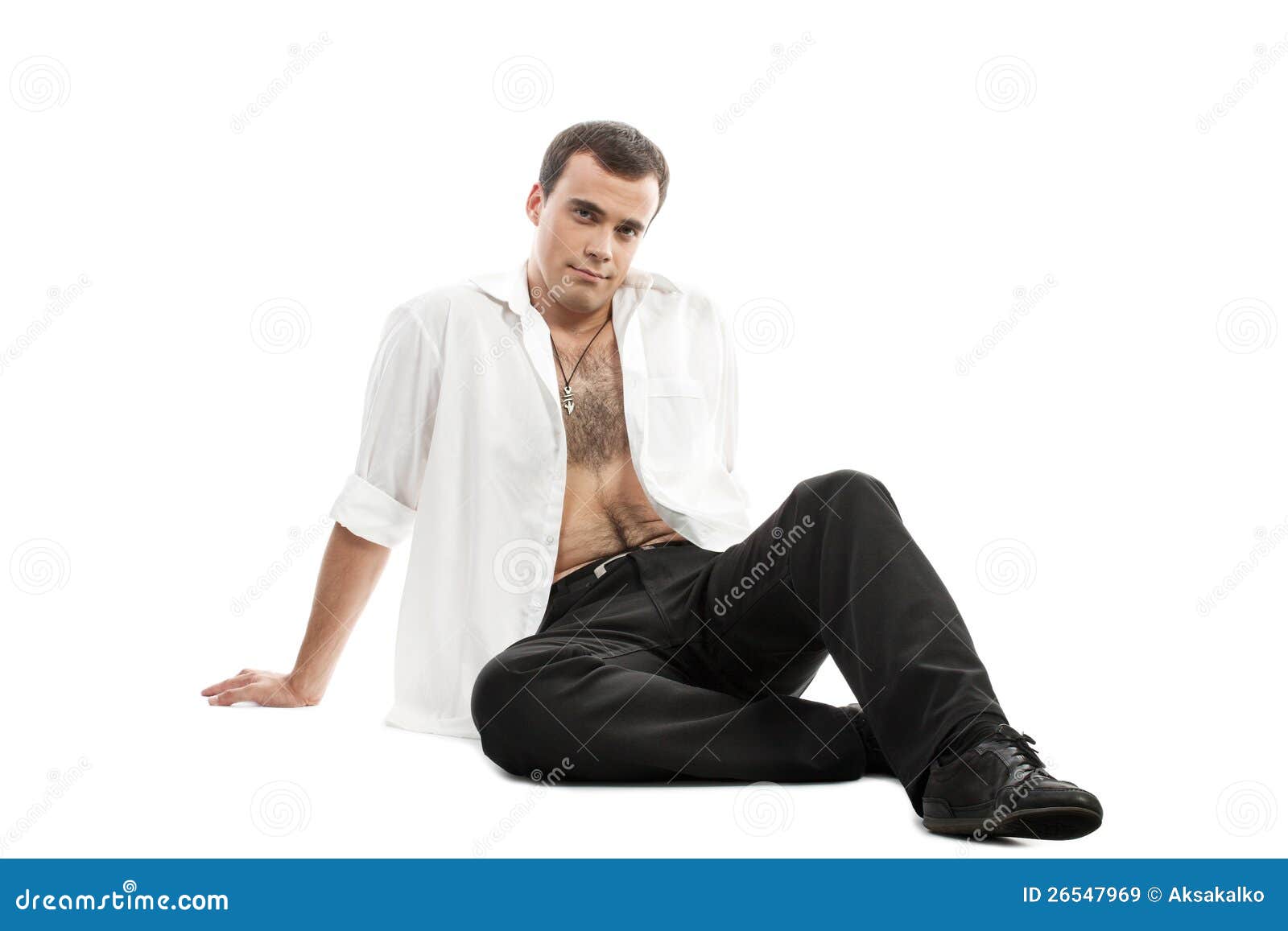 Young Man Sitting and Looking at Camera Stock Image - Image of ...