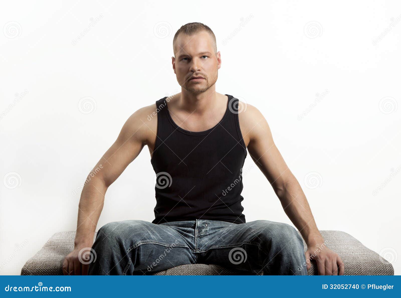 Young Man Sitting, Looking at the Camera Stock Photo - Image of healthy ...